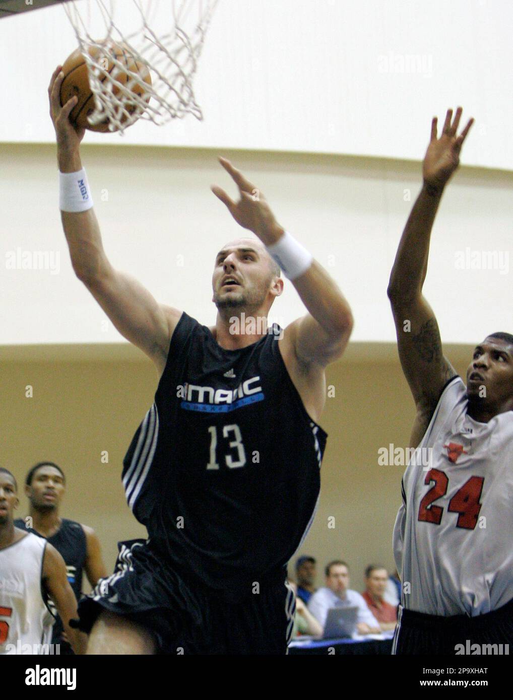 Orlando Magic center Marcin Gortat (13), of Poland, gets off a shot in ...