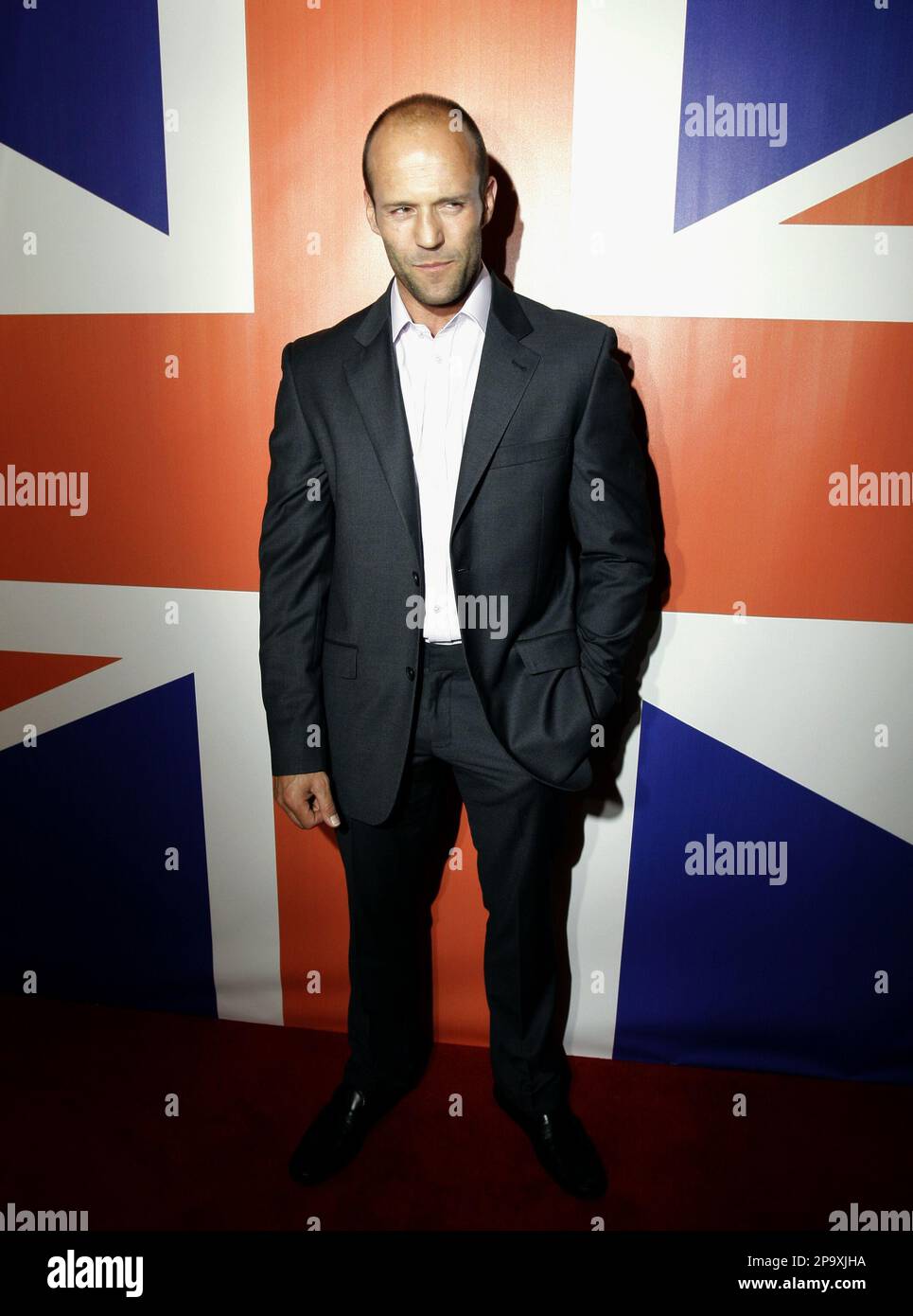 British actor Jason Statham poses for a photo as he arrives for the ...