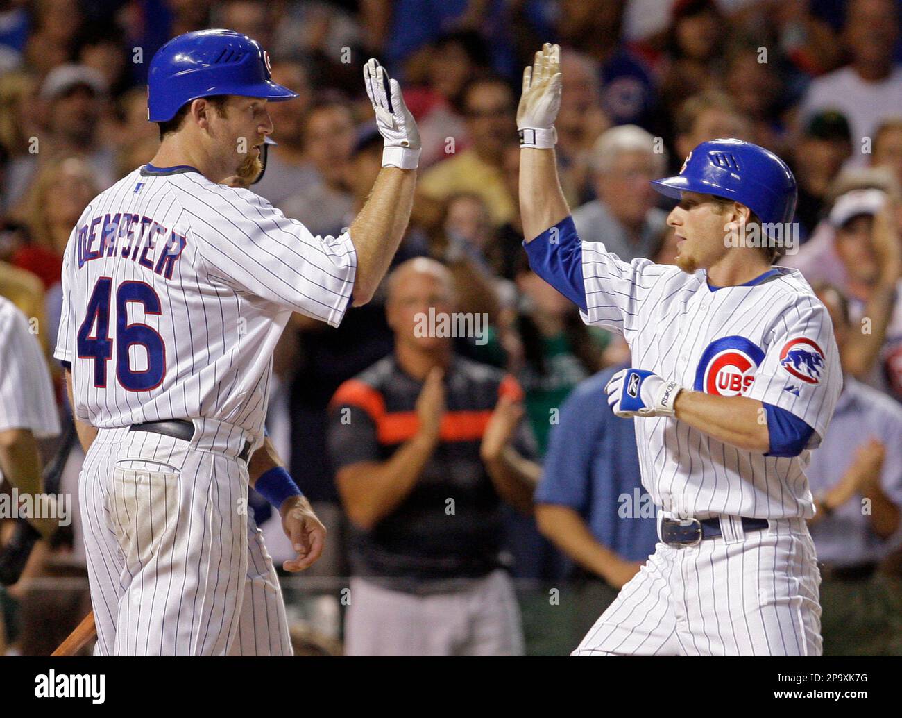 Chicago Cubs' Mike Fontenot and Ryan Dempster celebrate after Fontenot ...