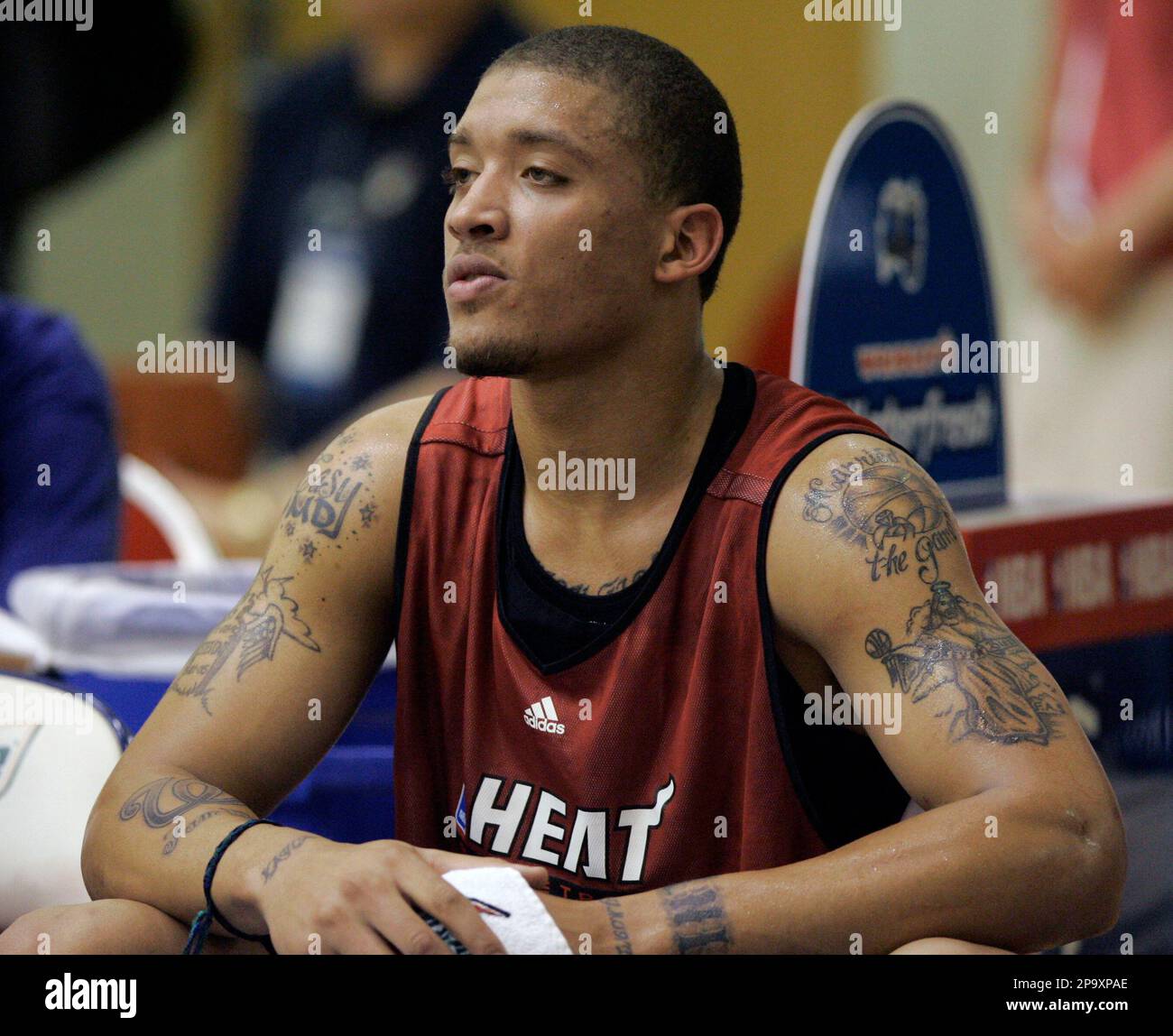 Miami Heat forward Michael Beasley takes a break on the bench during an ...