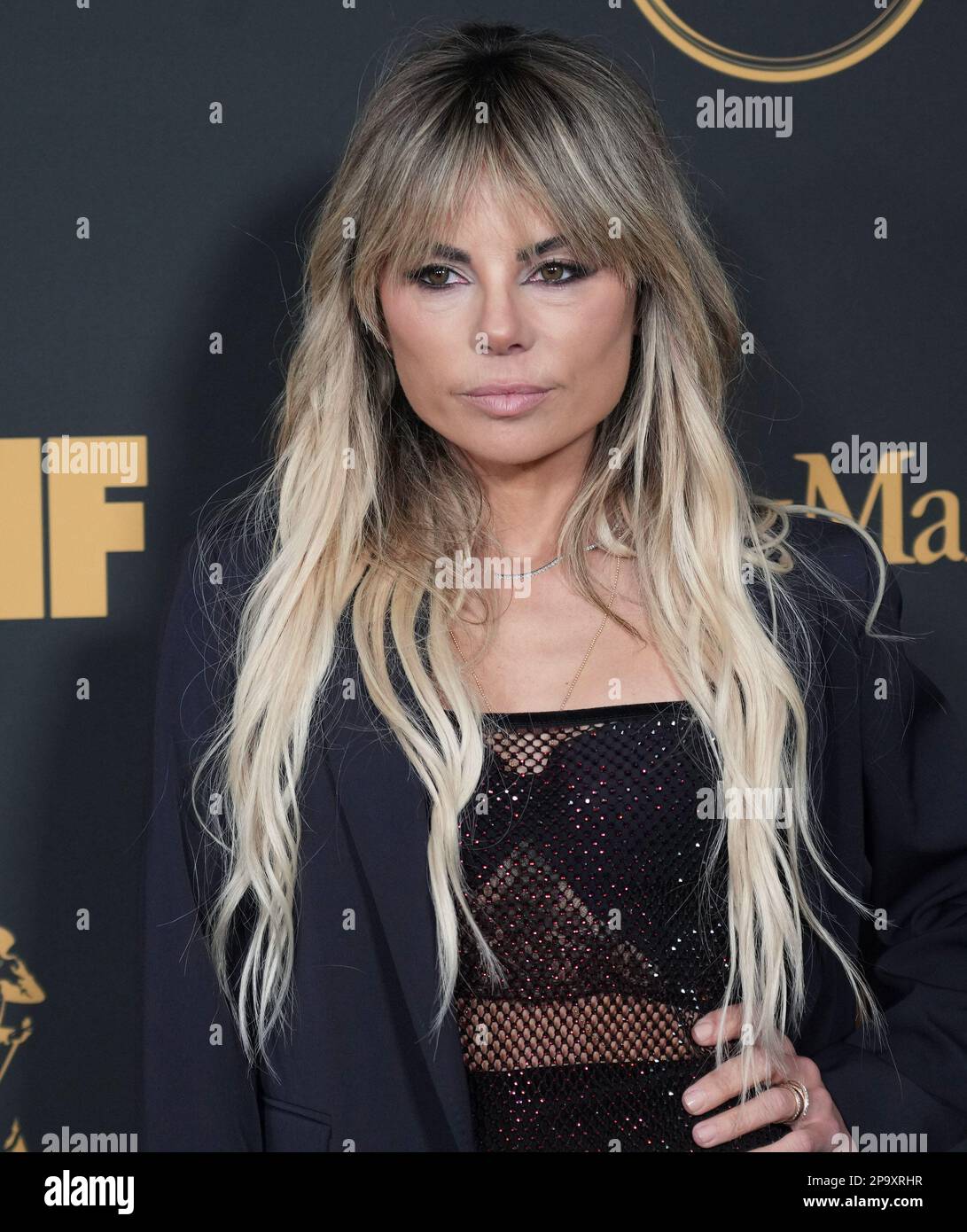 Erica Pelosini arrives at the 16th Annual WIF Oscar Party held at ...