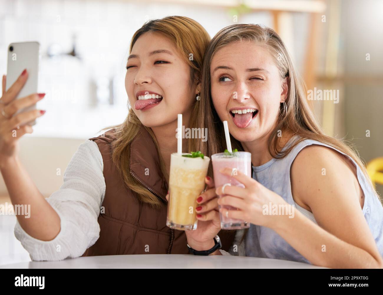 Selfie, wink or funny friends take profile picture in cafe with happy ...