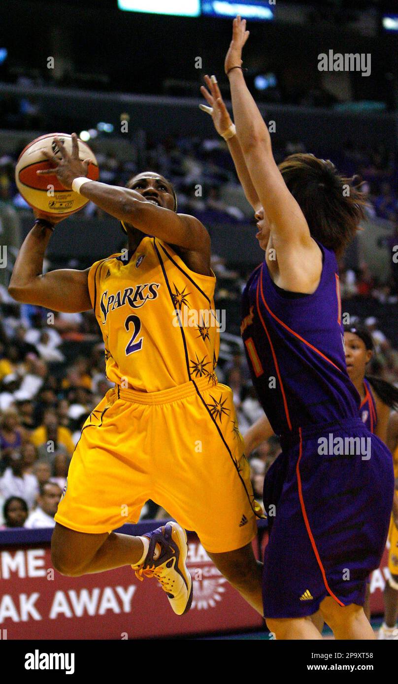 Los Angeles Sparks' Temeka Johnson (2) gets by Phoenix Mercury's Yuko ...
