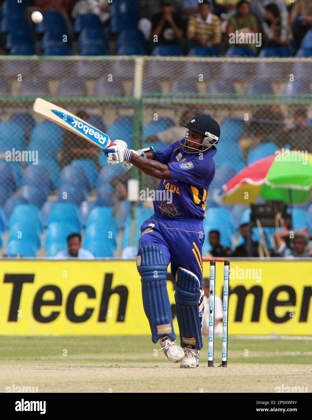 Sri Lankan batsman Sanath Jayasuriya plays a shot for boundary against ...