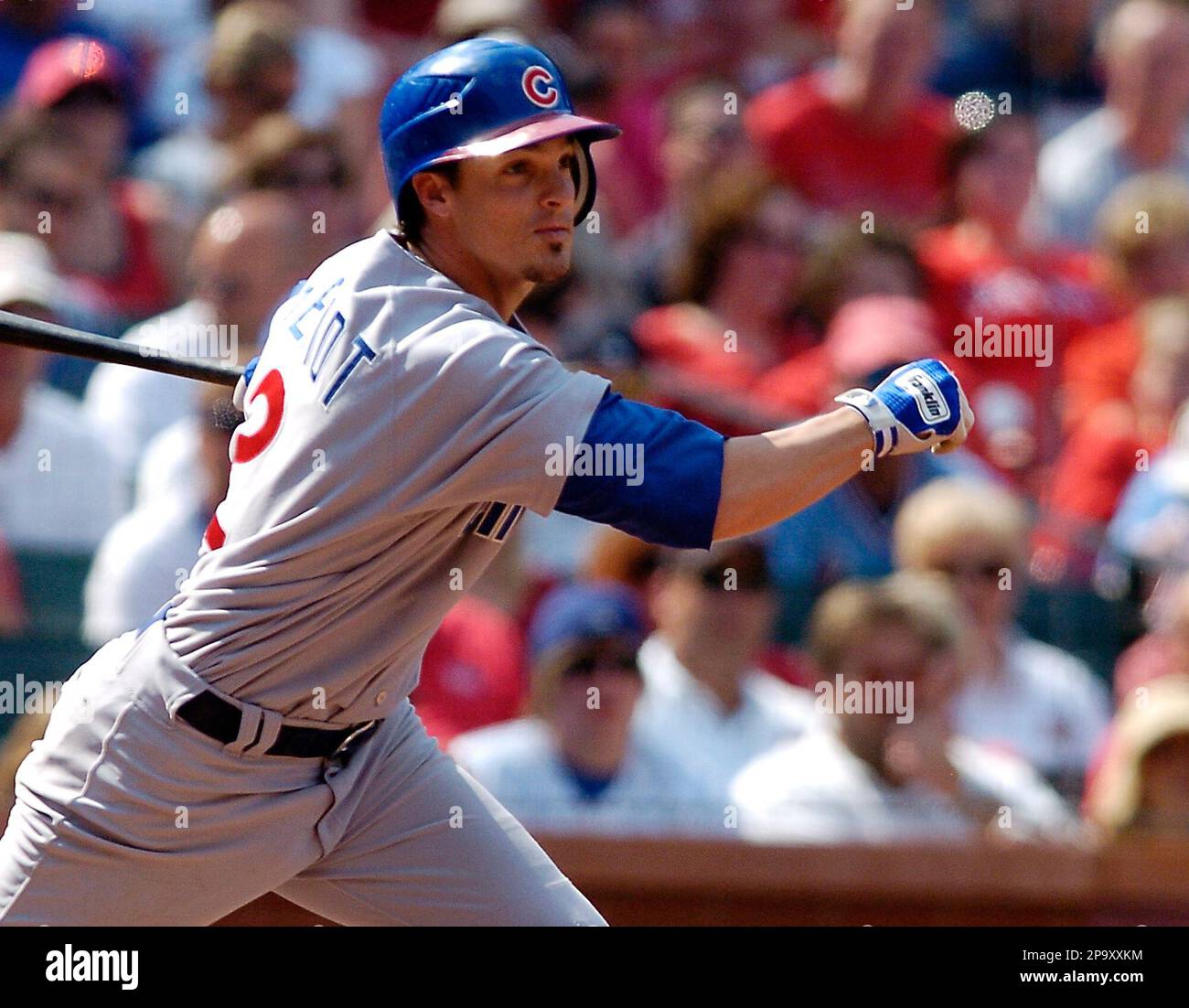 Chicago Cubs' Ryan Theriot follows through on an RBI single in the ...