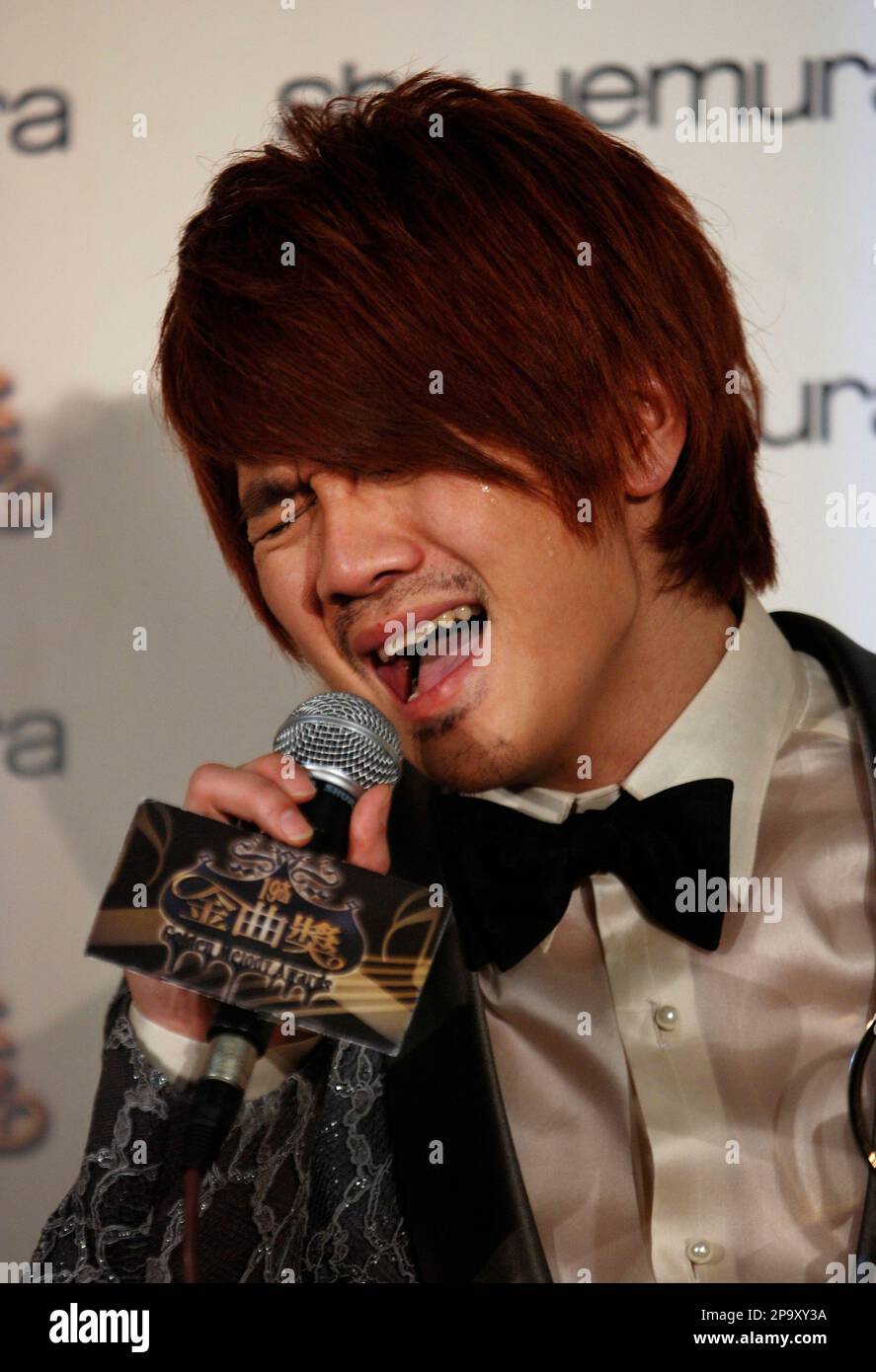 Malaysian singer Gary Cao sings after winning "Best Male Singer" at the ...