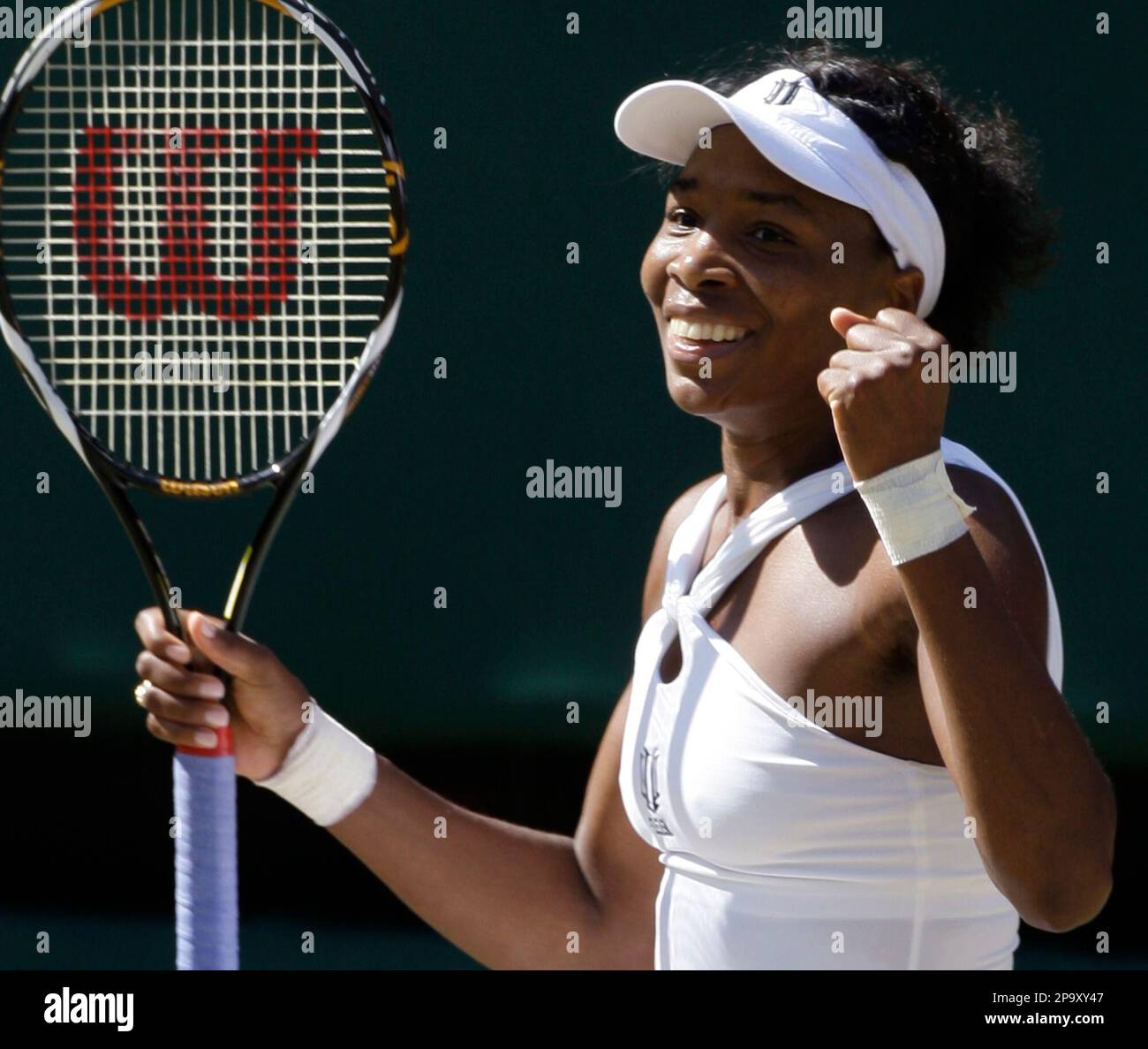 Venus Williams reacts as she defeats her sister Venus to win the Women ...