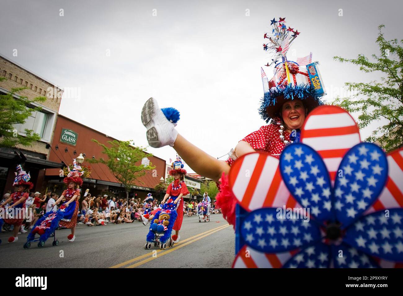 "Red Hot MaMas" Gayle Roadifer kicks a leg up Friday, July 4, 2008 as ...