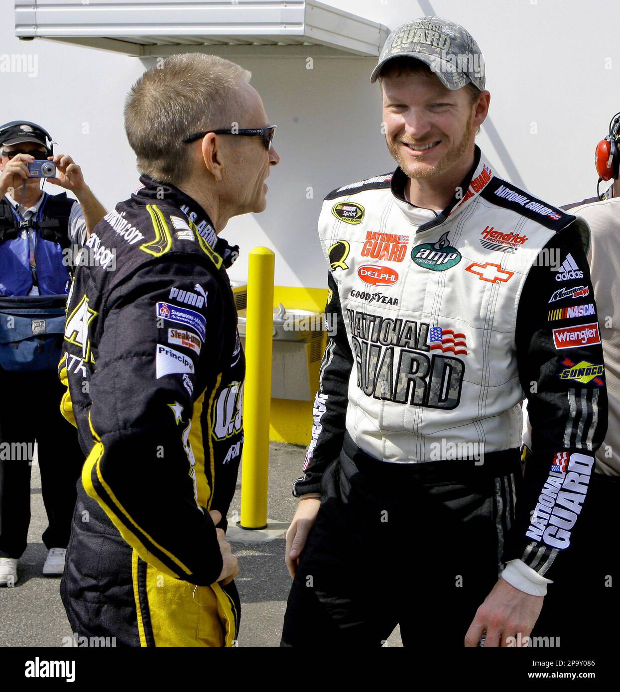 NASCAR drivers Dale Earnhardt Jr., right, and Mark Martin talk before ...