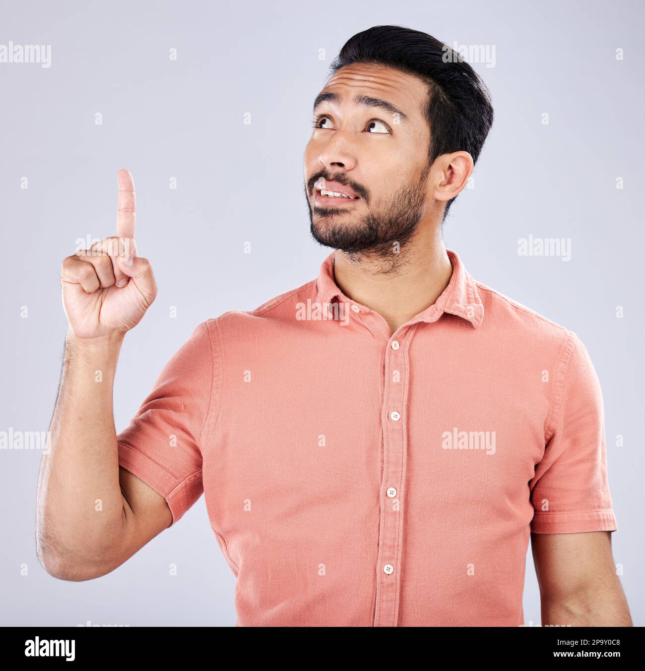 Mockup, Asian man and pointing for space, advertising and happiness ...