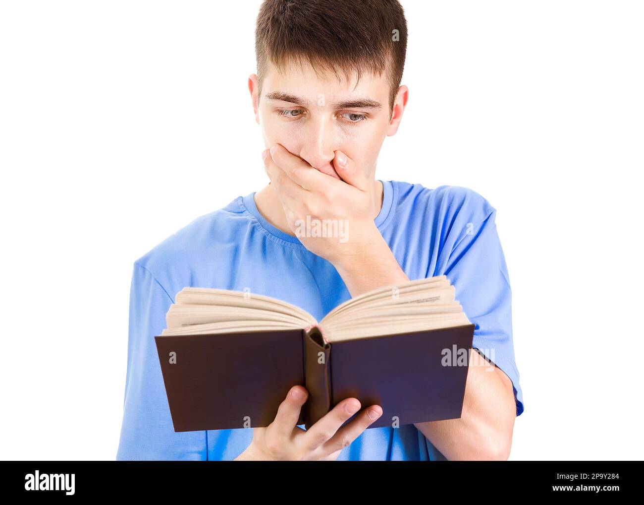 Shocked Young Man read a Book Isolated on the White Background Stock ...