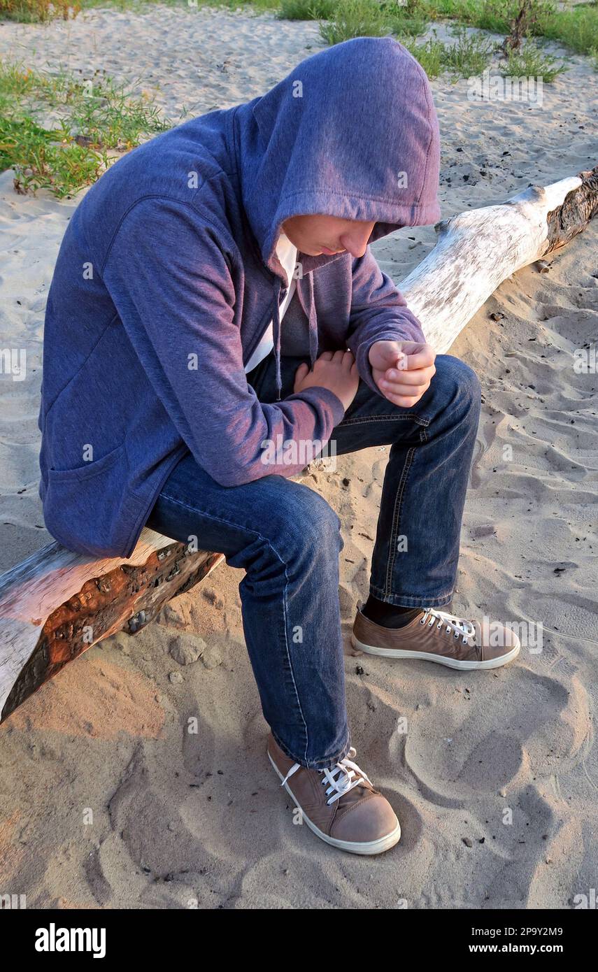 Unhappy sad lonely hoodie hi-res stock photography and images - Alamy