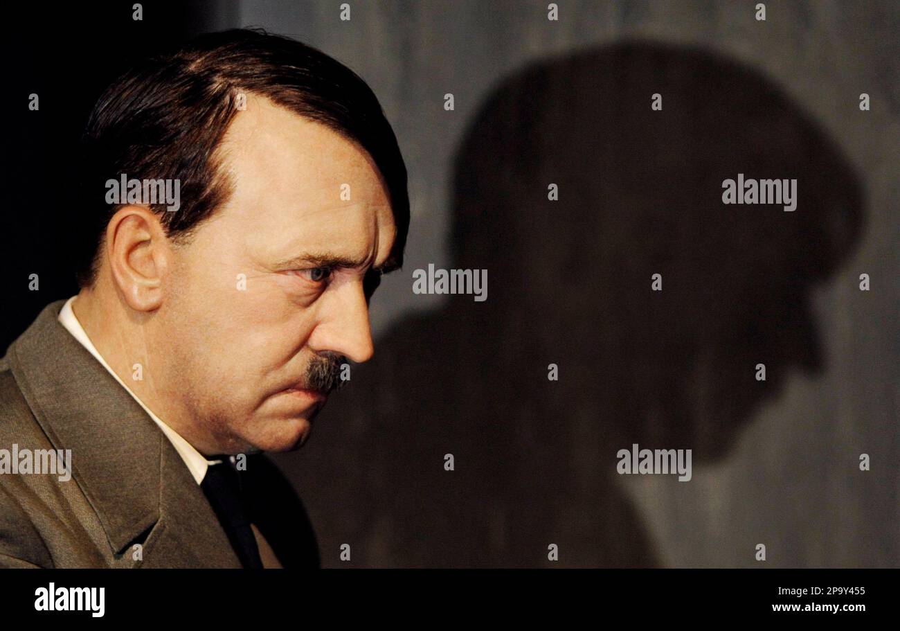 A wax figure of former German dictator Adolf Hitler casts a shadow at ...