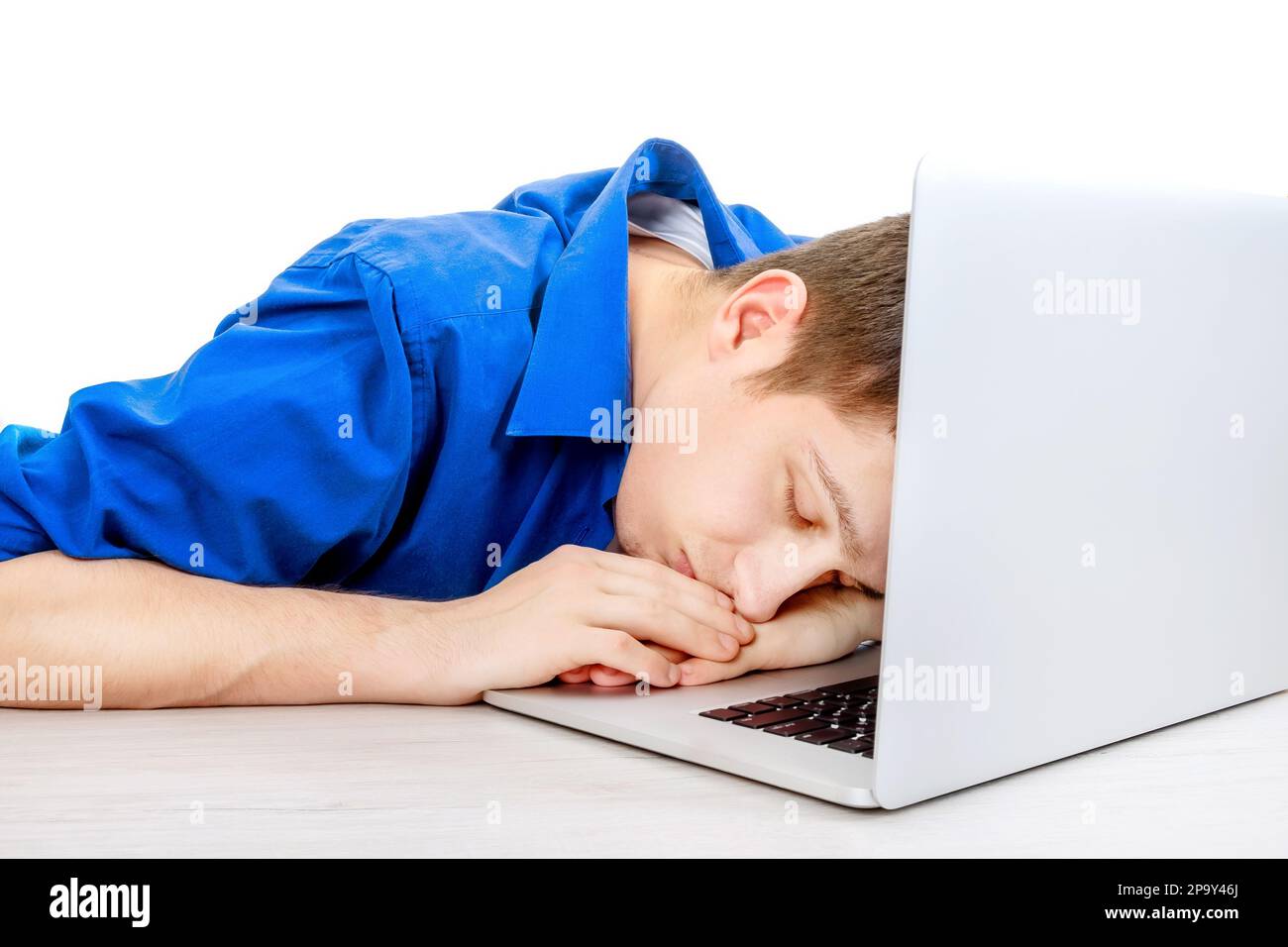 Tired Young Man sleep on the Laptop Computer Isolated on the White ...