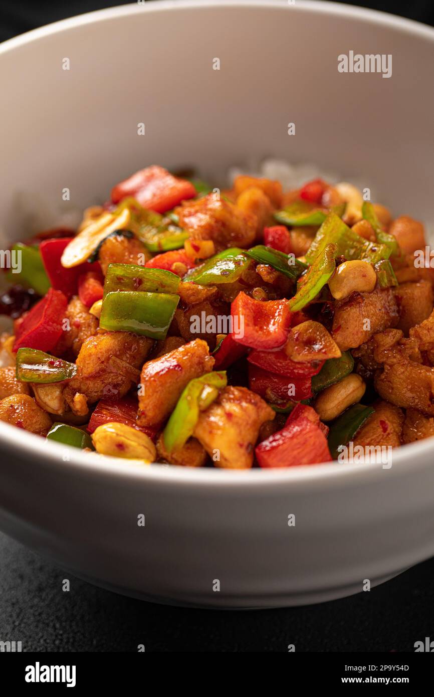 Chinese gong bao chicken with rice and peanuts Stock Photo - Alamy