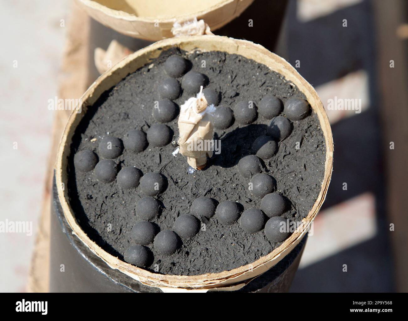 A view inside of a non-functioning fireworks mortar shell shows the ...