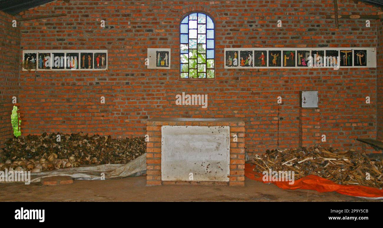 Bones belonging to the victims of the 1994 Rwandan genocide flank the ...