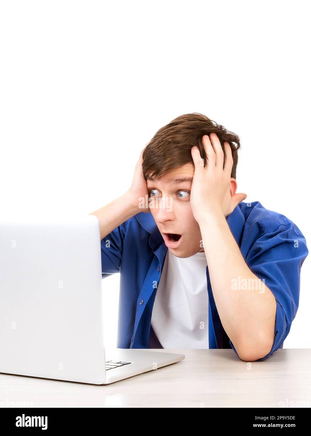 Shocked Young Man with Laptop Isolated on the White Background Stock ...