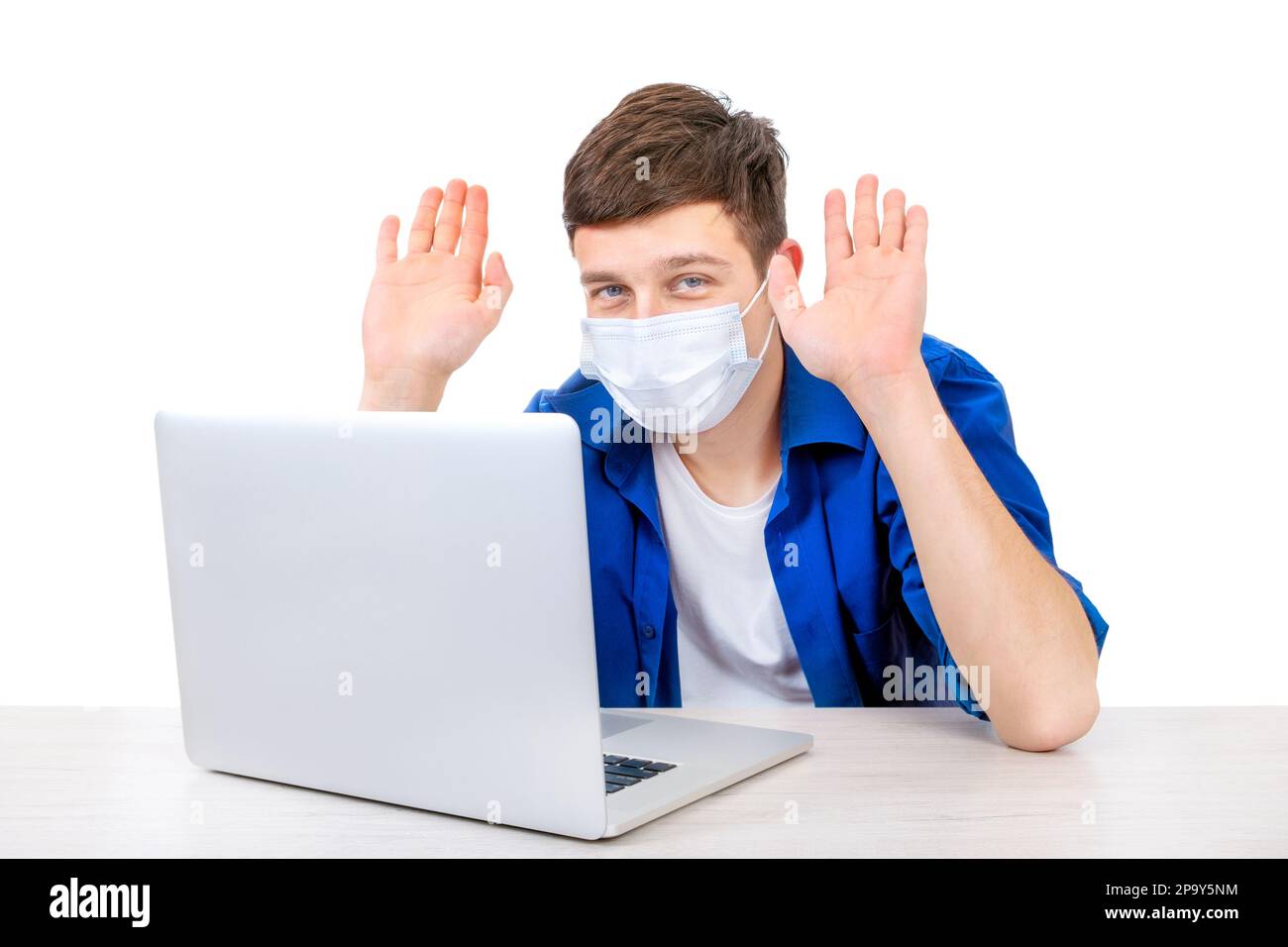 Young Man with a Flu Mask with use a Laptop Computer for a Video Chat ...