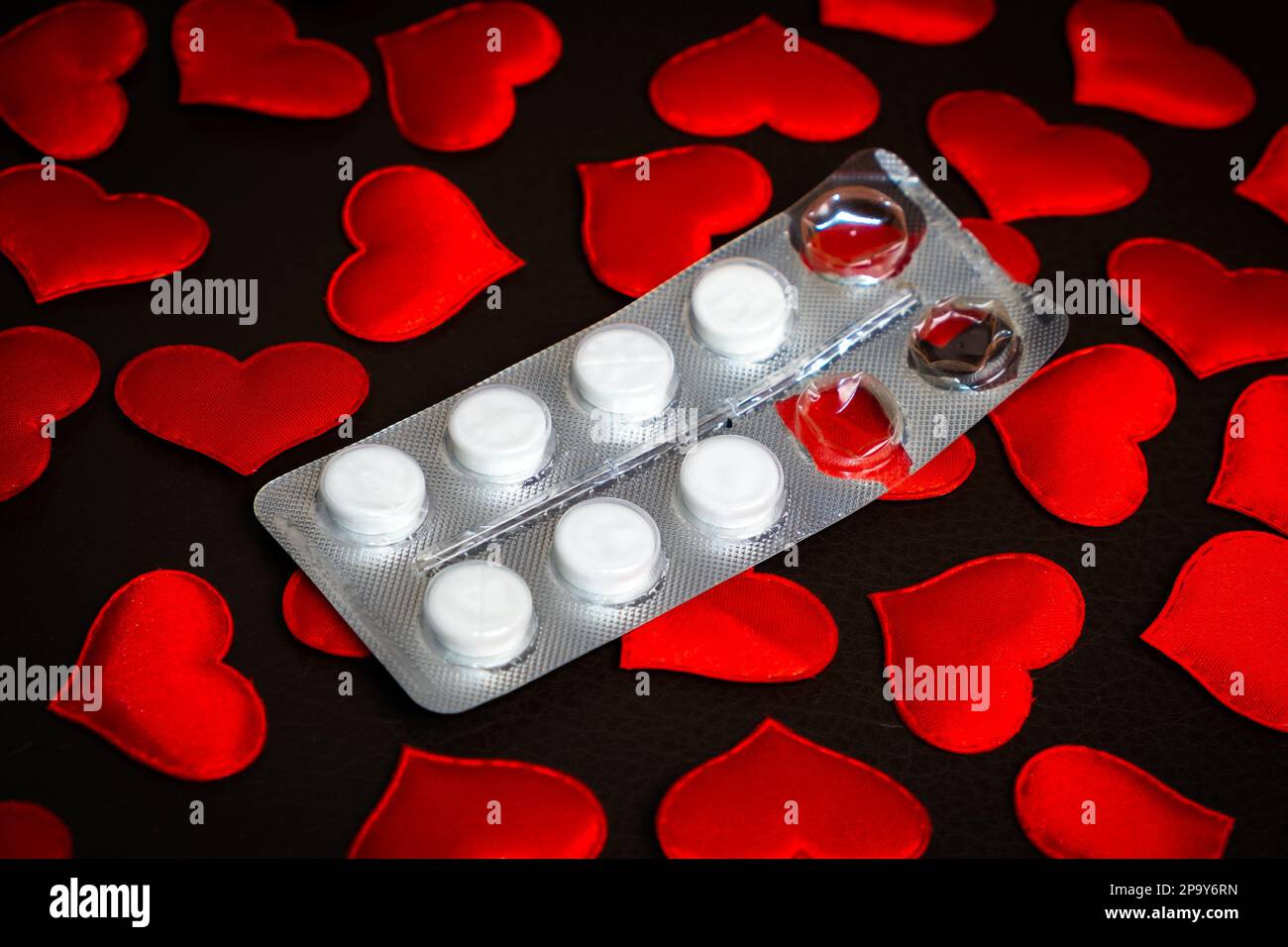 Scattered red tablets hi-res stock photography and images - Alamy