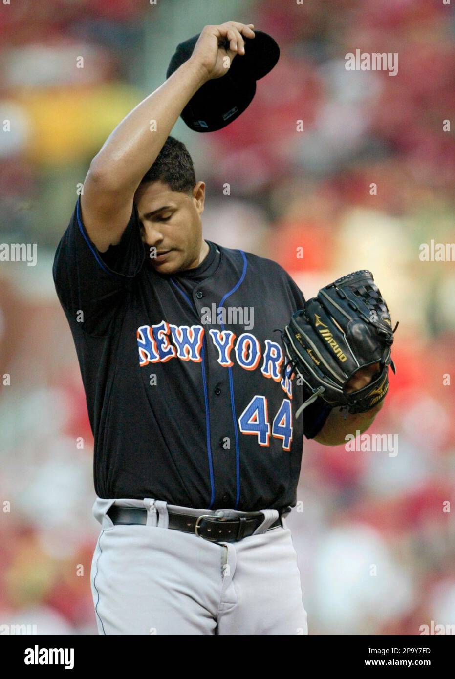 New York Mets Tony Armas, Jr. reacts after giving up an RBI double to ...