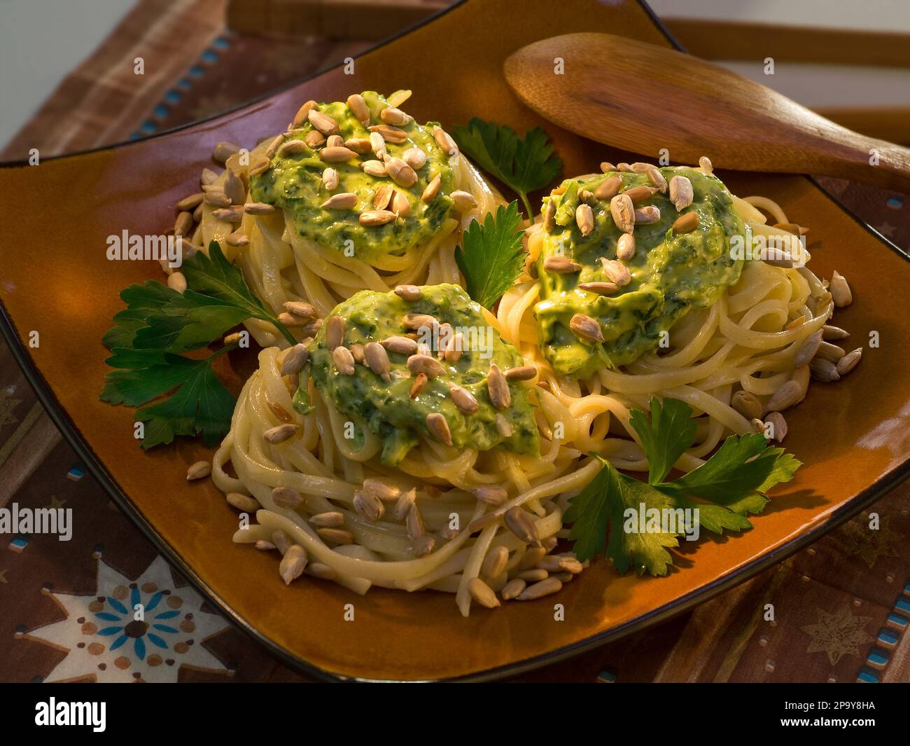 Pasta with herbs and sunflower seeds Stock Photo - Alamy