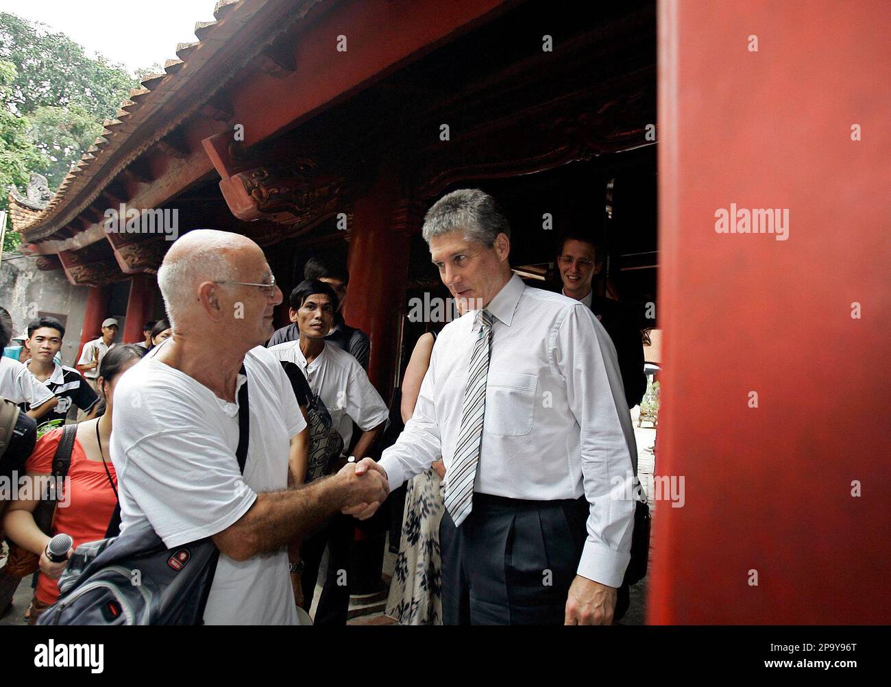 Australian Foreign Minister Stephen Smith, right, greets Australian ...