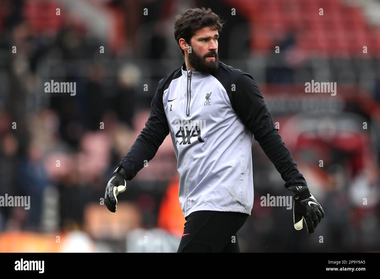 Liverpool goalkeeper Alisson Becker warming up prior to kick-off before ...