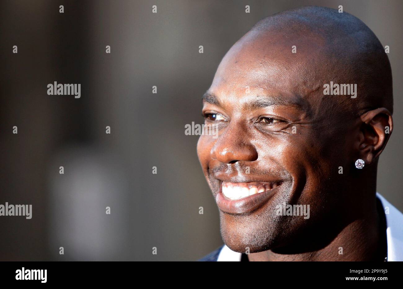 Football player Terrell Owens arrives at the "Hancock" premiere Monday ...