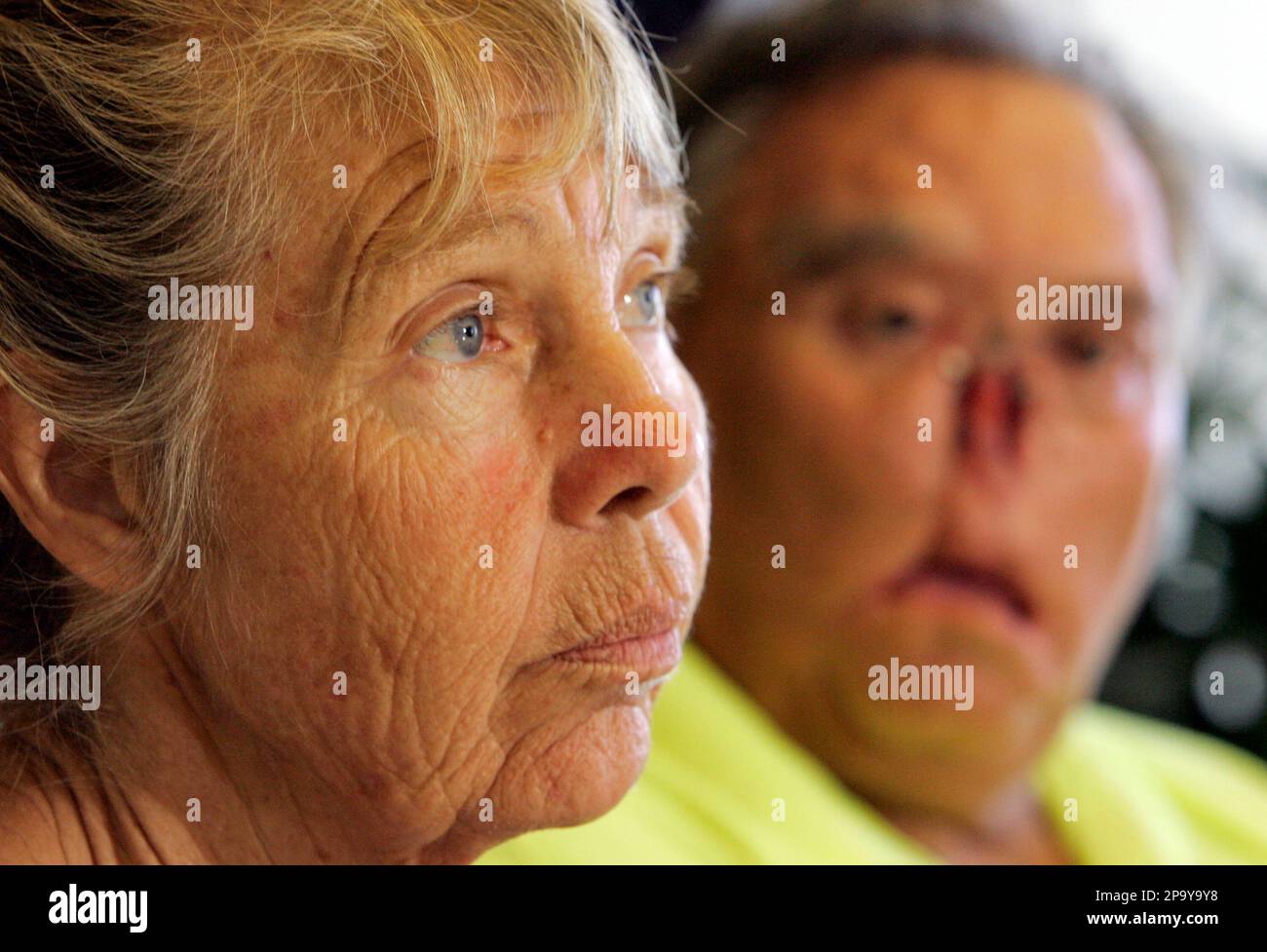 LaDonna, left, and St. James Davis hold a news conference Monday, June ...