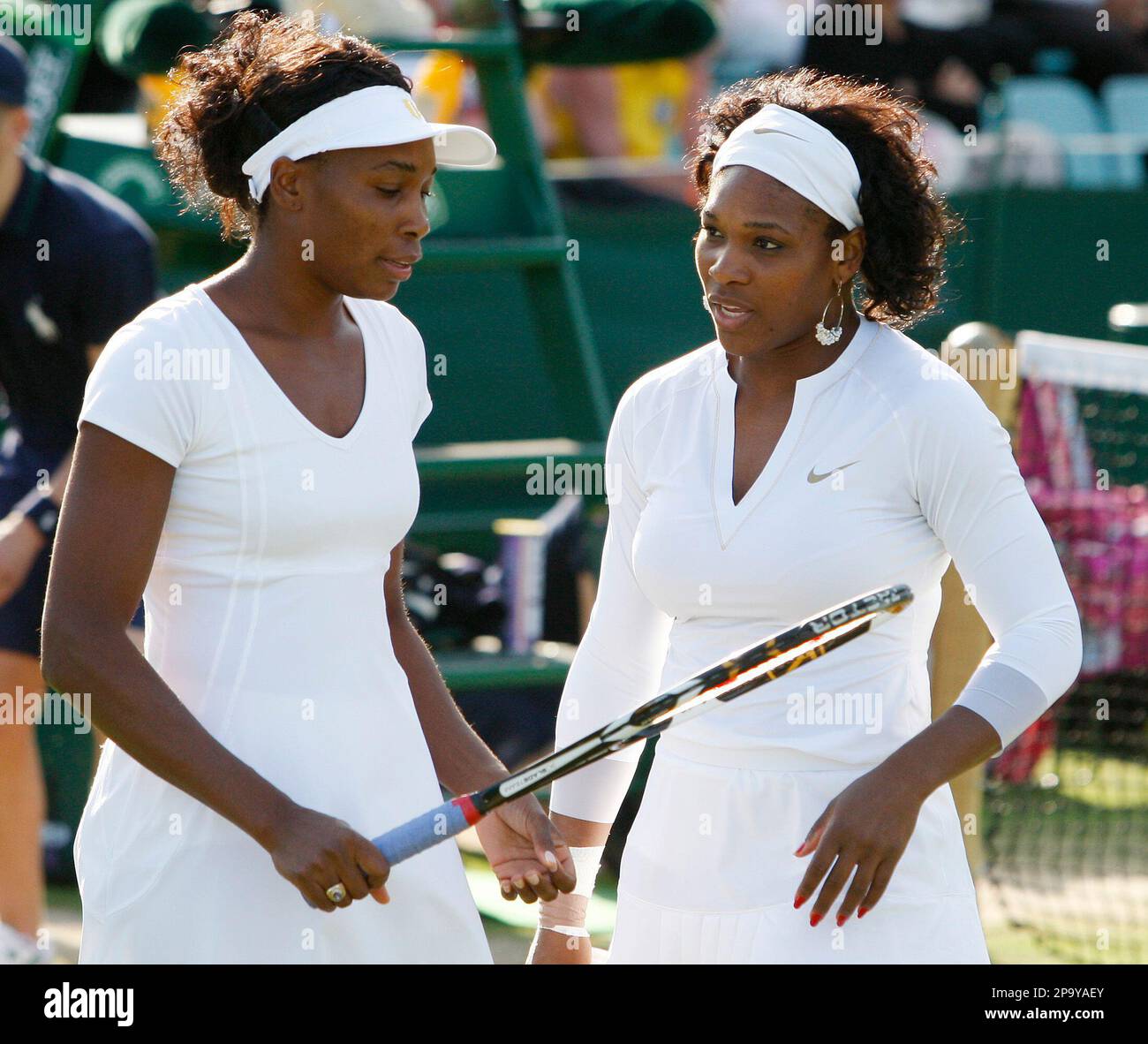 Williams sisters Serena right, and Venus in action during their doubles ...