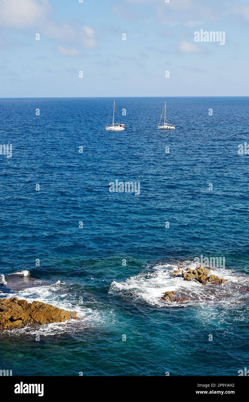 Photo of two beautiful sailboats crossing the open sea Stock Photo - Alamy