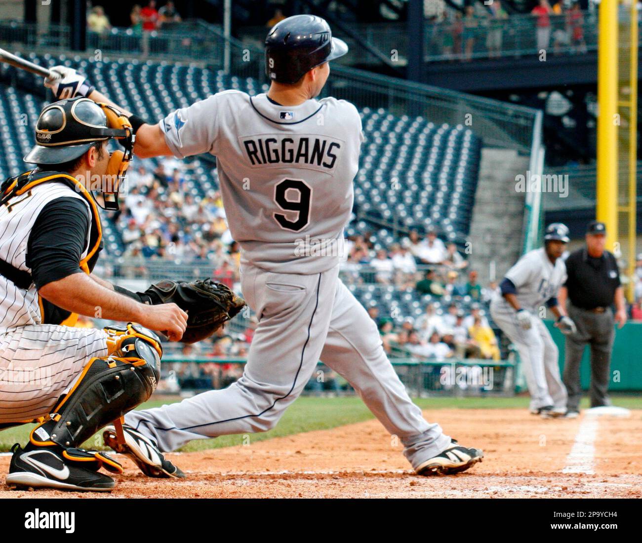 Tampa Bay Rays' Shawn Riggans (9) singles to deep center field to score ...