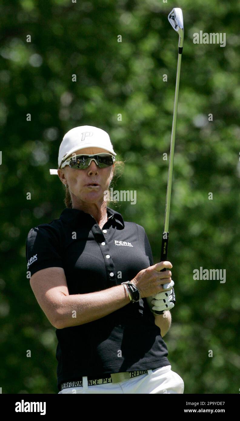 Helen Alfredsson, of Sweden, watches her tee shot on the fourth hole ...