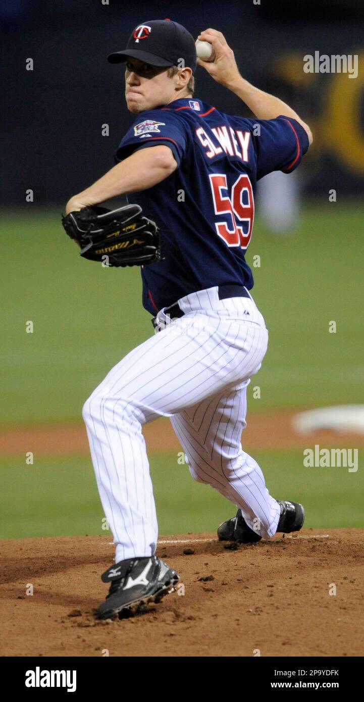 Minnesota Twins' Kevin Slowey throws against the Milwaukee Brewers in ...