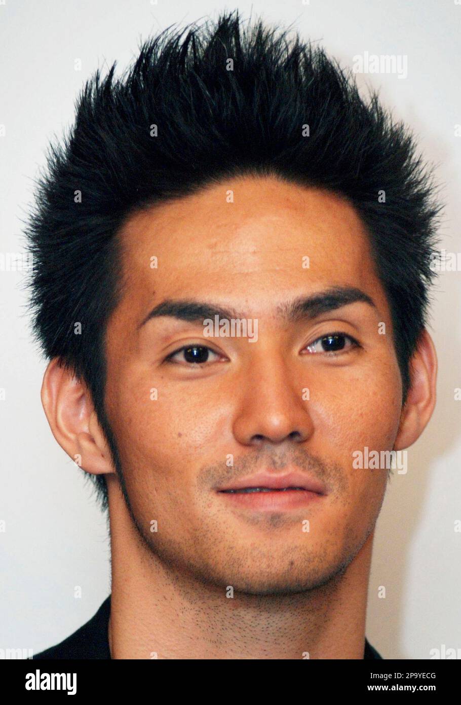 Japanese singer Kosuke Atari smiles during a press event for announcing ...