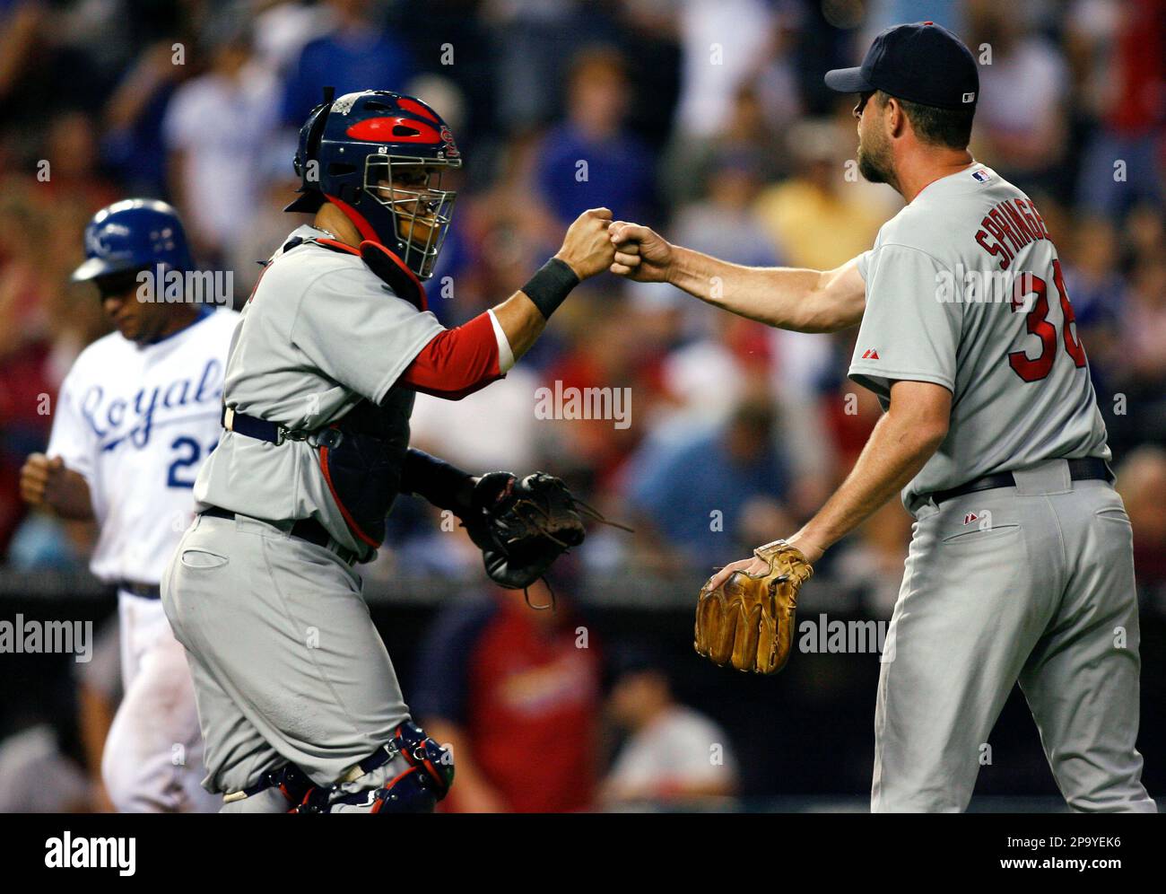 St. Louis Cardinals pitcher Russ Springer, right, and catcher Yadier ...