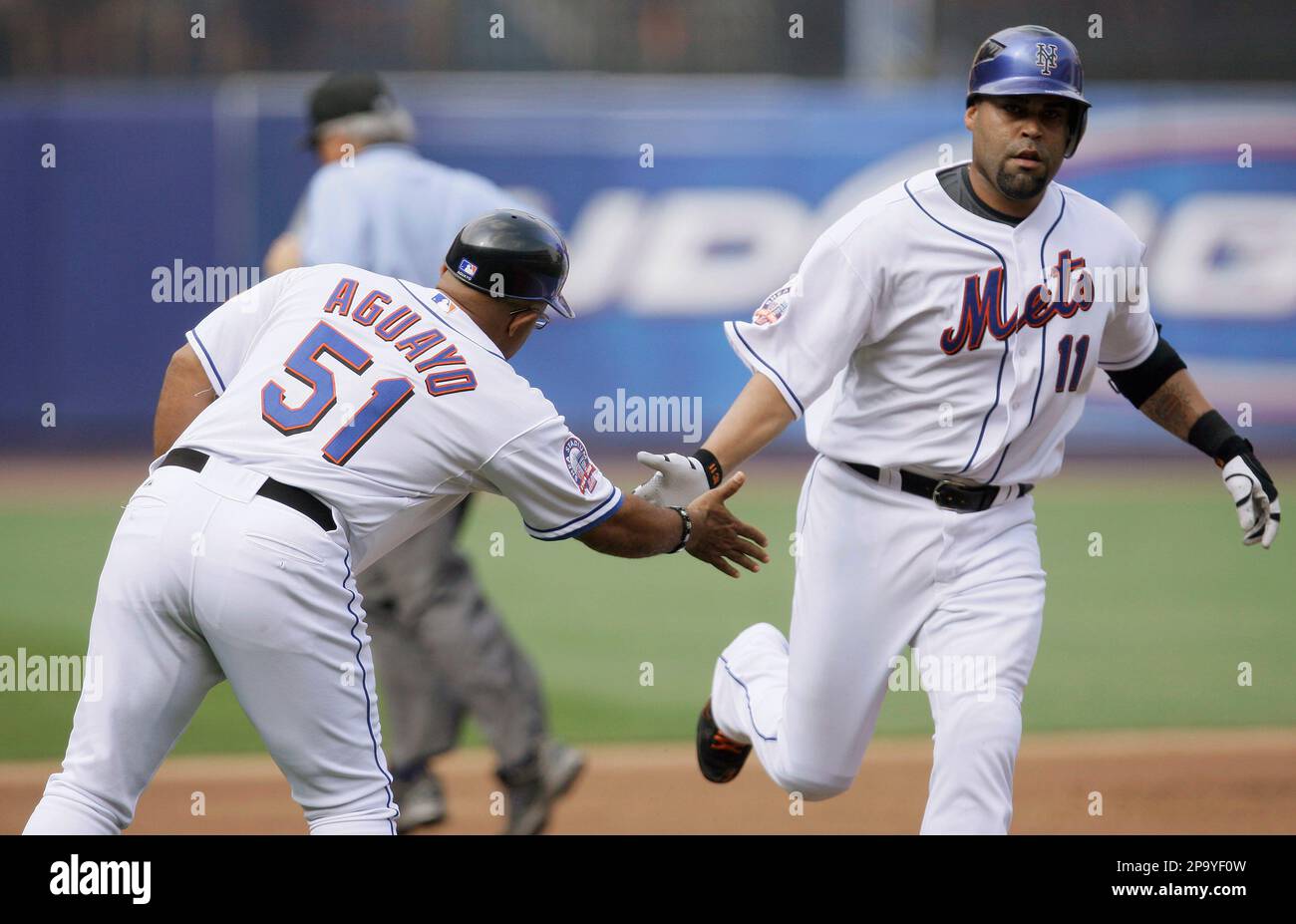 New York Mets' Ramon Castro is congratulated by third base coach Luis ...