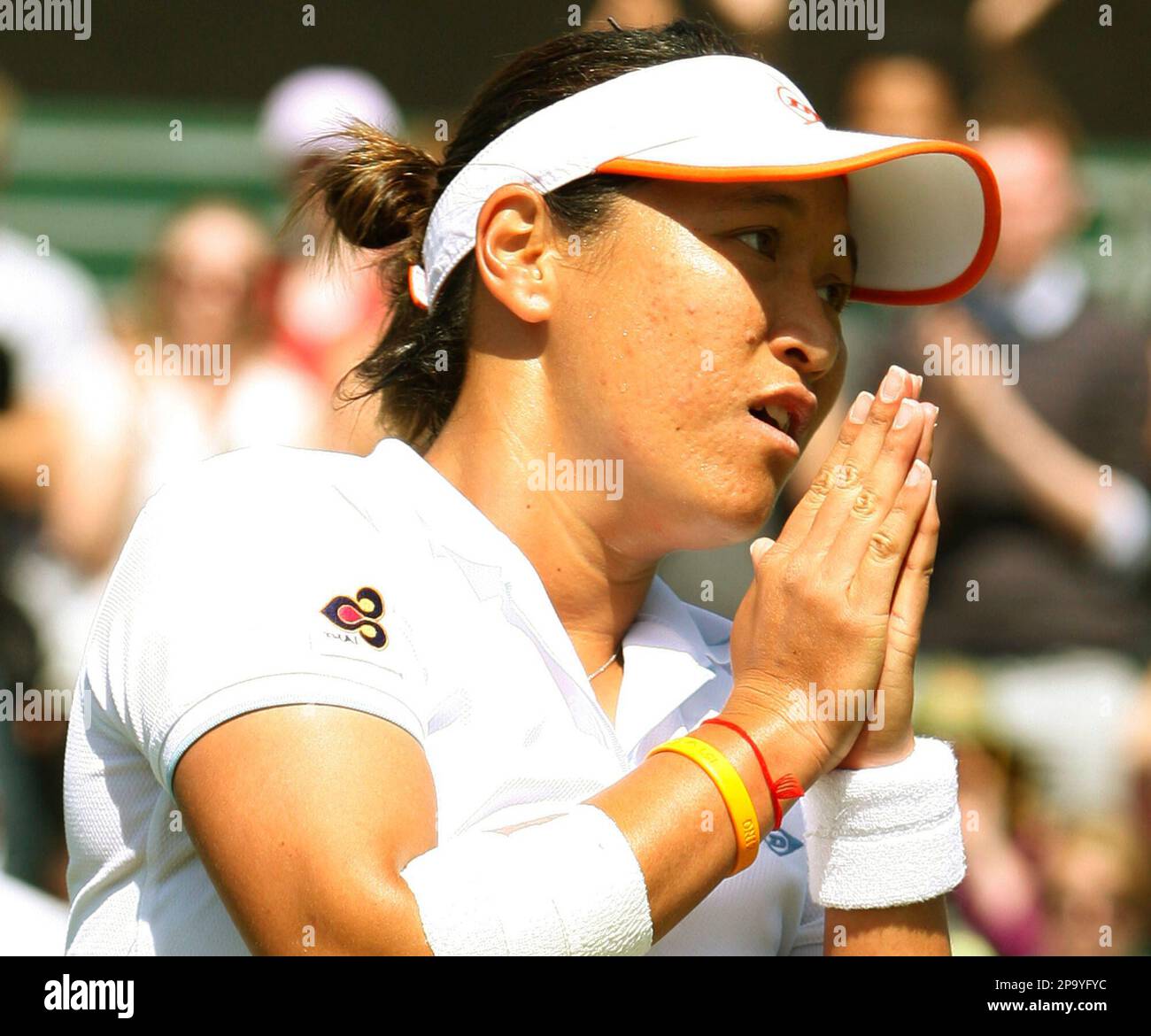 Thailand's Tamarine Tanasugarn salutes the crowd, after defeating New ...