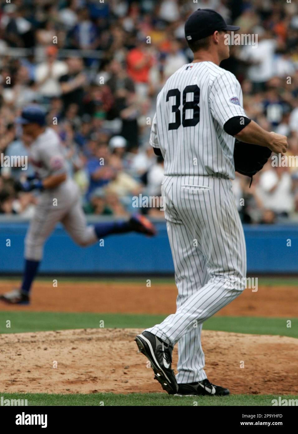 New York Yankees relief pitcher Dan Giese (38) looks on as New York ...