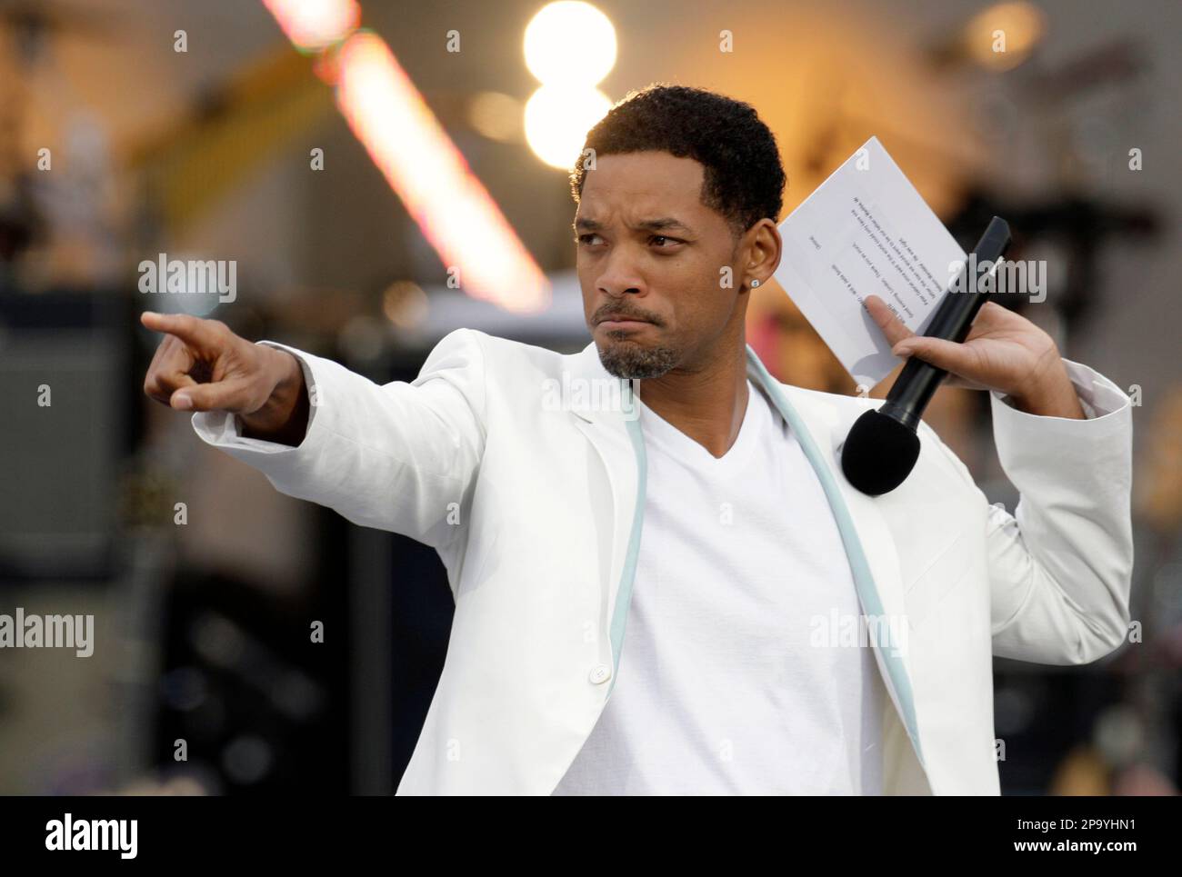 U.S. performer Will Smith gestures as he opens the 46664 charity ...
