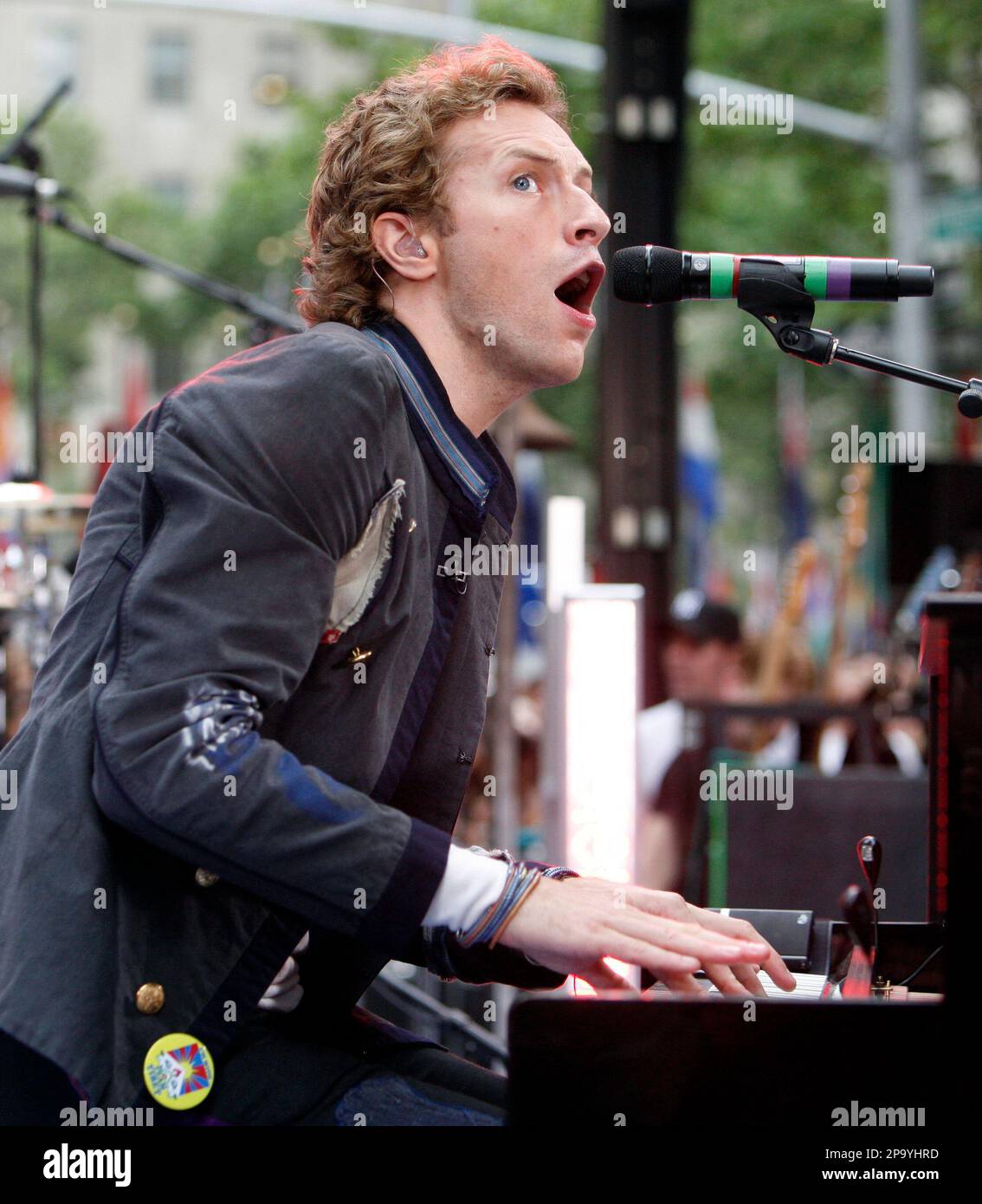 Chris Martin, lead singer of Coldplay, performs with the group on the ...