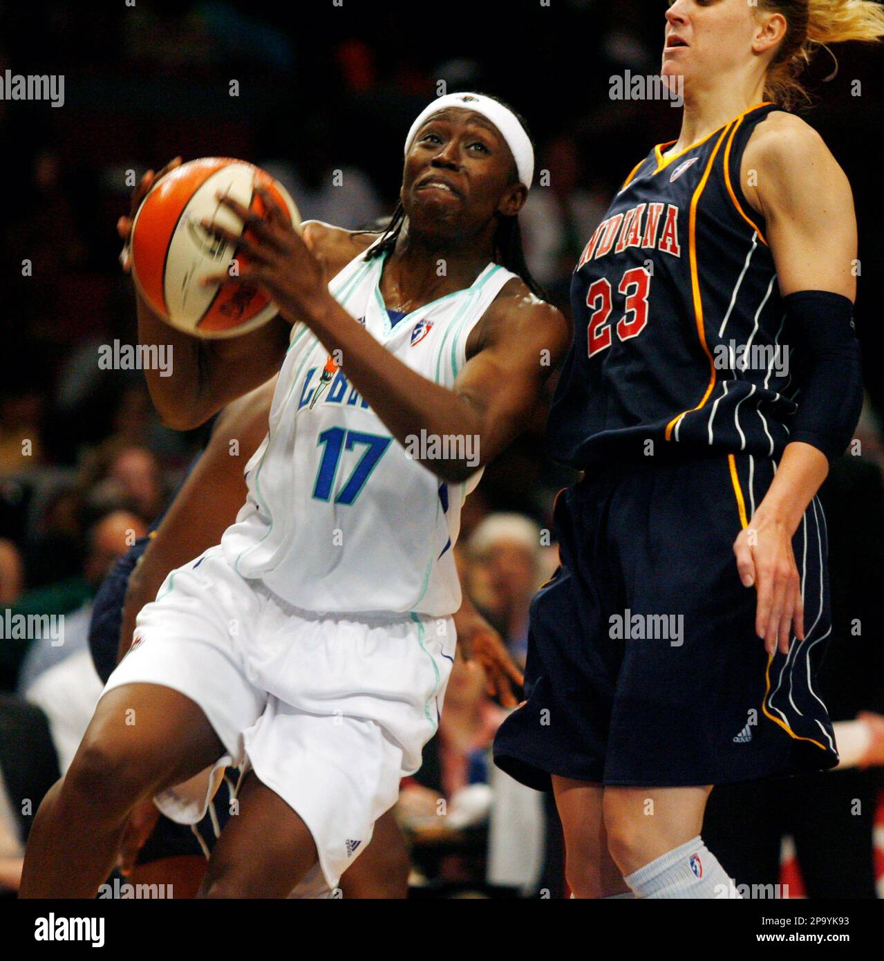 New York Liberty's Essence Carson (17) drives on Indiana Fever's Katie ...