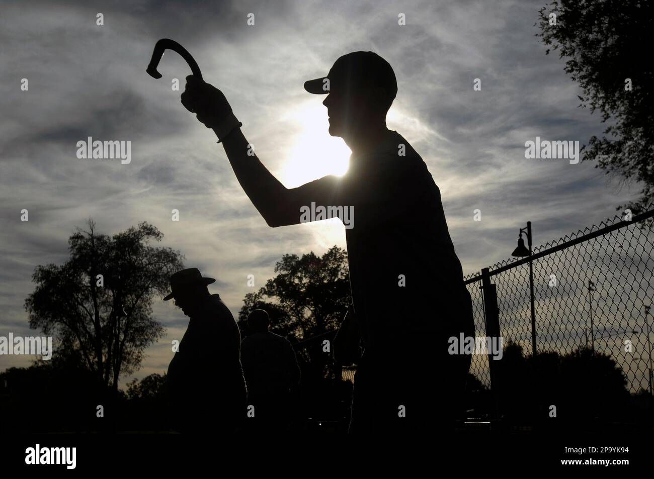 David Schotte, of Nampa, Idaho pitches a horseshoe during a game, on ...