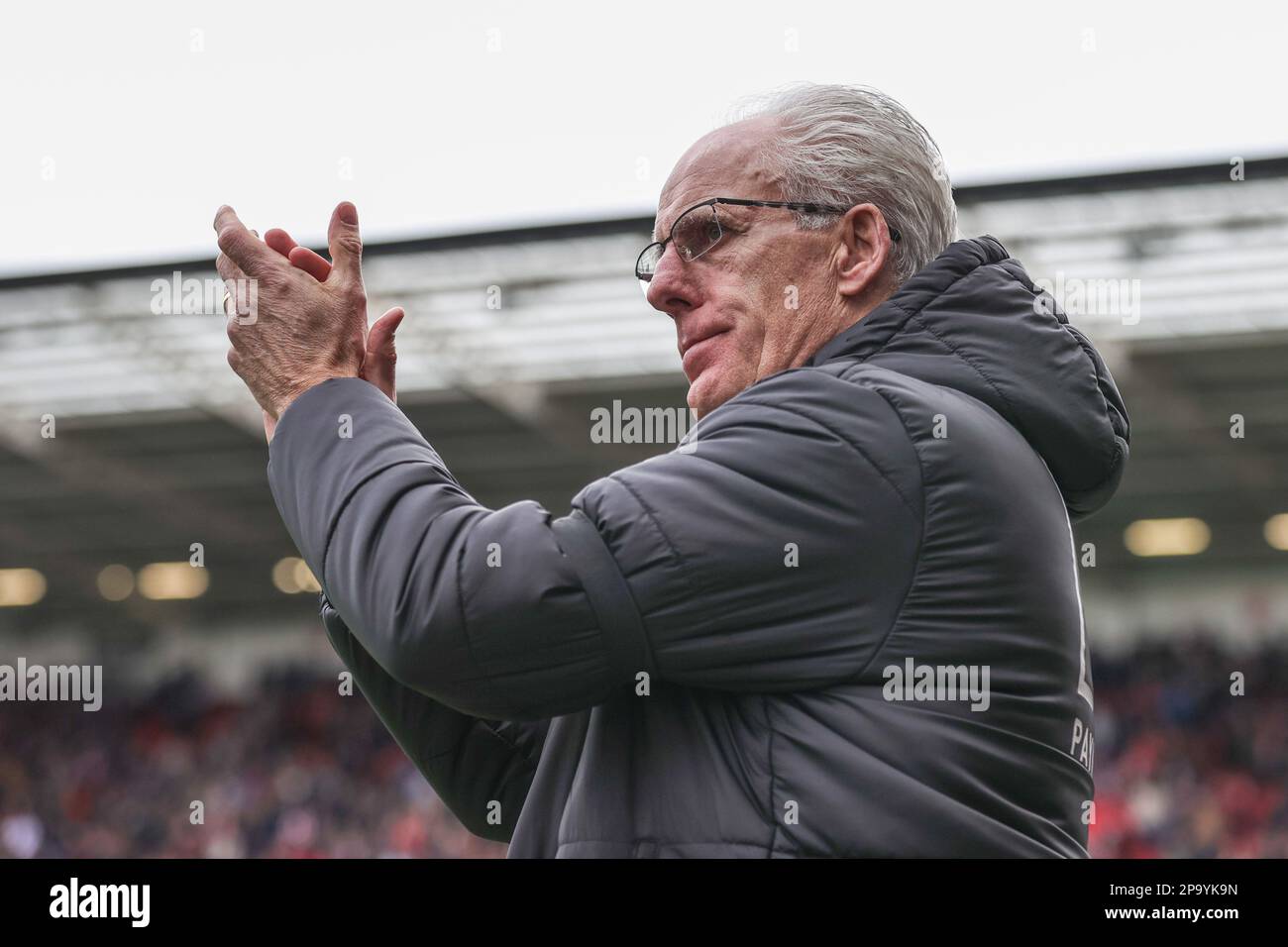Mick McCarthy manager of Blackpool applouds the traveling fans during ...