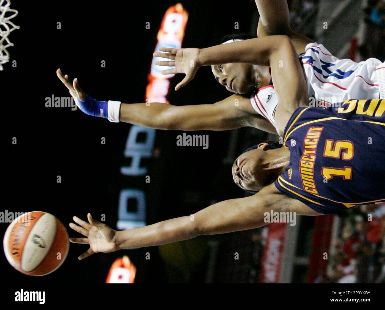Detroit Shock forward Cheryl Ford, right, defends against a shot by ...