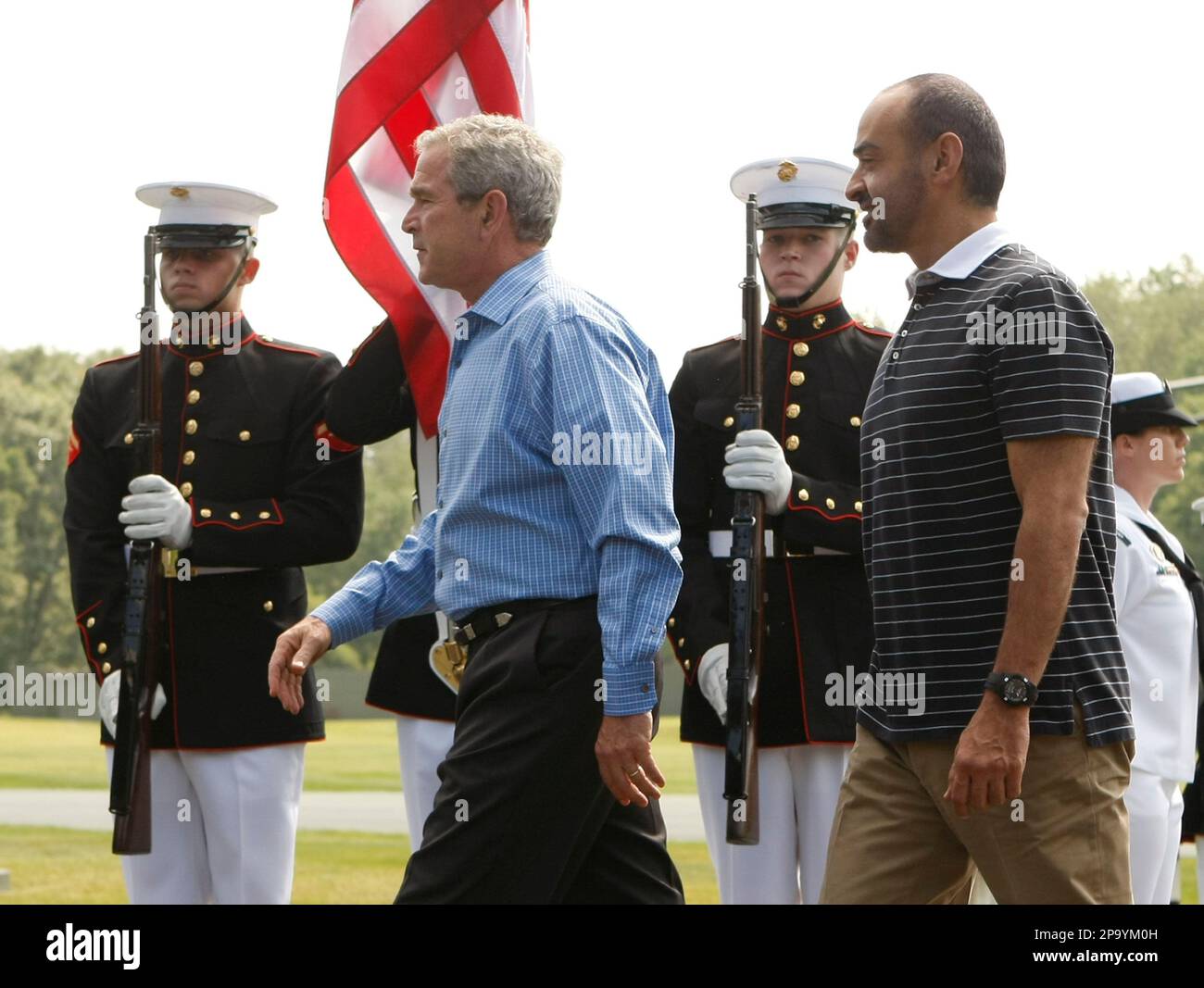 President Bush, left, walks with Crown Prince of Abu Dhabi, Sheik ...
