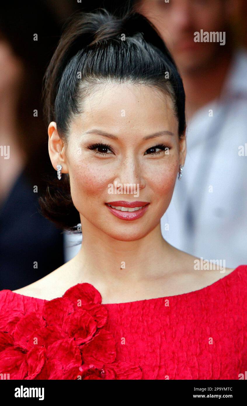 American Actress Lucy Liu, meets fans as she arrives for a premiere of ...