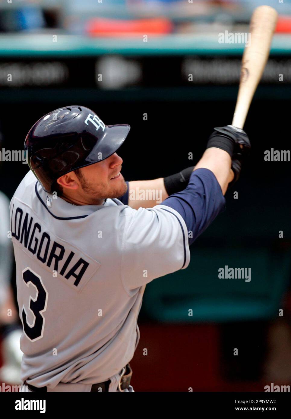 Tampa Bay Rays' Evan Longoria follows through on his solo home run ...