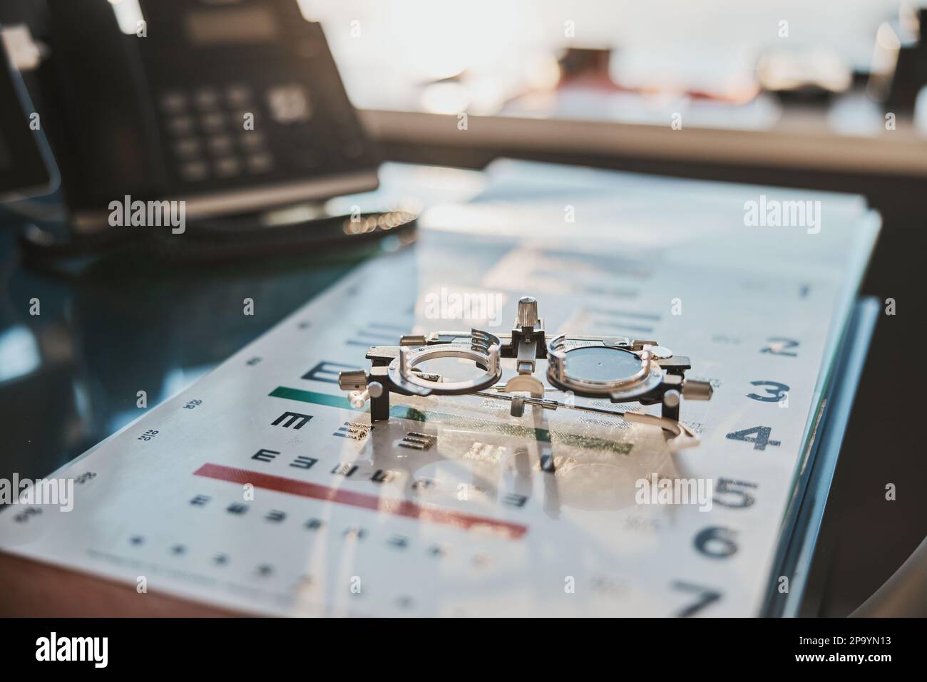 Ophthalmology, vision and optometry equipment with lenses and letter ...